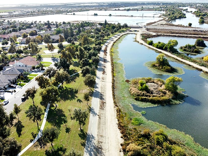 Bakersfield's waterside path offers the ultimate retirement twofer—neighborhood convenience on one side, nature's serenity on the other.