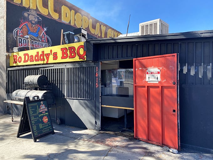 That colorful cartoon pig isn't just cute – he's inviting you to discover some seriously soulful urban BBQ.
