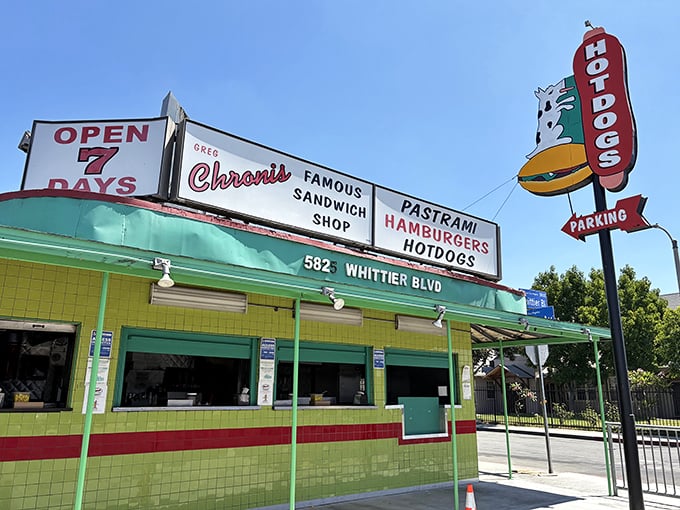 That green-tiled storefront isn’t just bold – it’s a gateway to pastrami paradise.