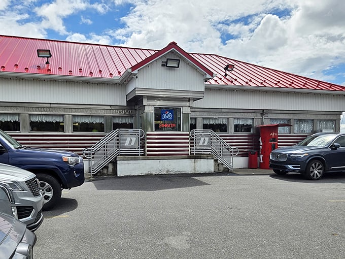 D's Diner's bright red roof stands out like a cardinal in winter—a cheerful signal that good food awaits inside.