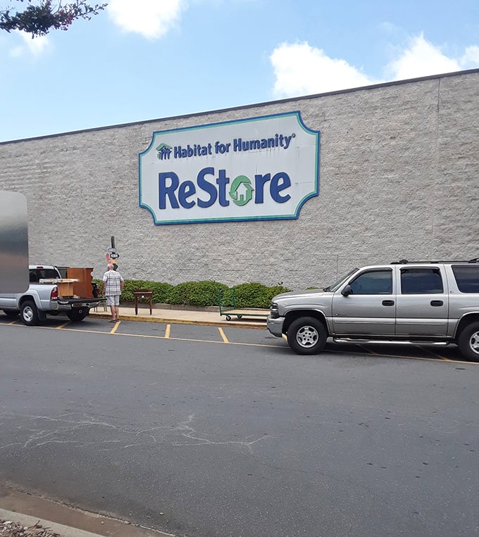 The massive Habitat for Humanity ReStore sign dominates this Charlotte building. Every purchase here helps build homes and hope for families in need—shopping with purpose!