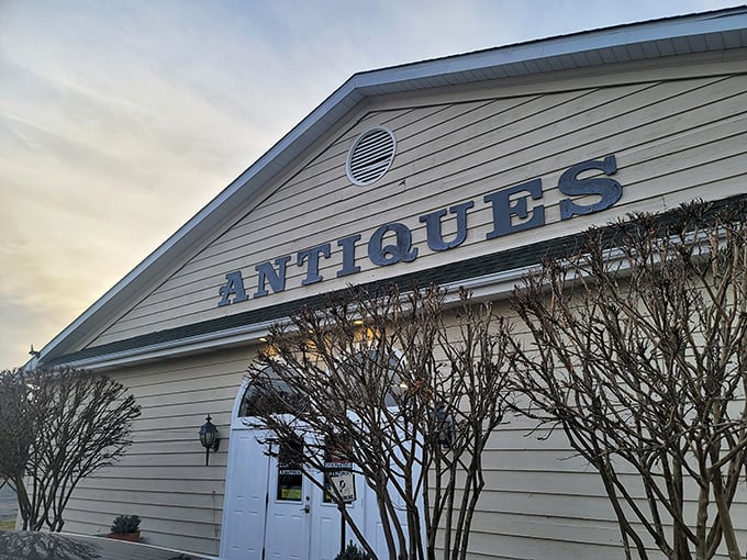 Clean lines and classic styling—Heritage Antique Market stands proudly against the sky. Those hydrangeas aren't just flowers—they're a welcome committee.