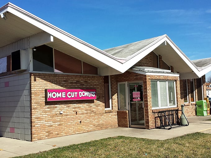 Home Cut Donuts' straightforward brick exterior promises no gimmicks—just honest-to-goodness donuts that have kept Joliet residents coming back for generations.