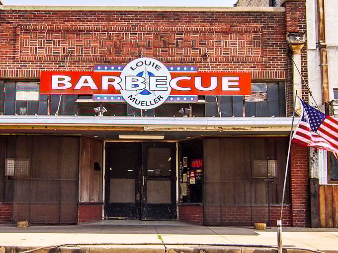 Louie Mueller's weathered brick walls have absorbed decades of smoke, creating barbecue history with every breath.