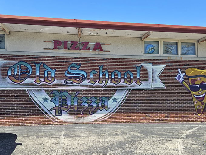 Old School Pizza's vintage mural proves small towns know their way around a pizza paddle just fine, thanks.