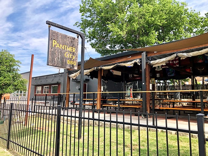 Panther City's wooden sign swinging in the Fort Worth breeze is like a friendly wave saying, "Get in here, you're hungry!"