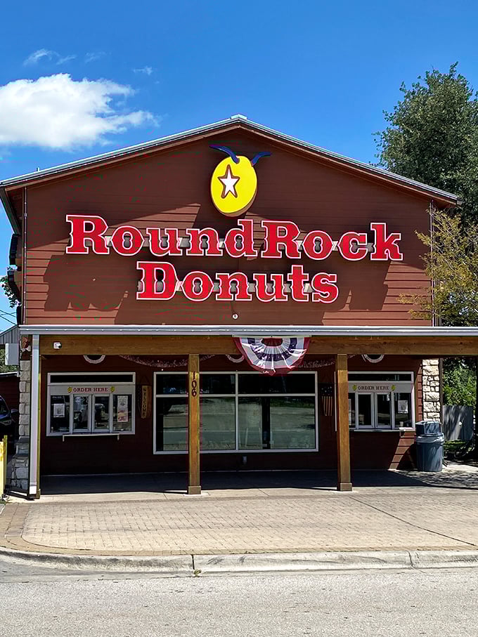 Rustic charm meets Texas tradition where orange donuts became legendary and tourists become pilgrims.
