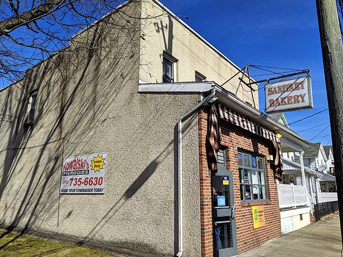Sanitary Bakery's vintage sign swinging above a brick storefront – where Nanticoke residents have gotten their paska bread fix for generations.