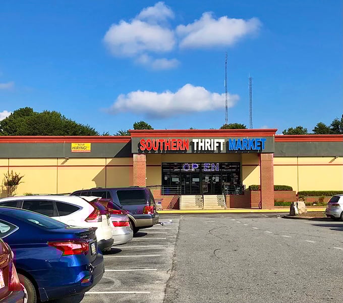 Southern Thrift Market's red-white-blue sign promises a patriotic duty to save money while finding hidden gems.