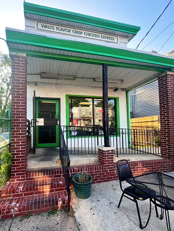 Walt's distinctive green trim frames a temple of fried chicken perfection – where crispy dreams come true one piece at a time.