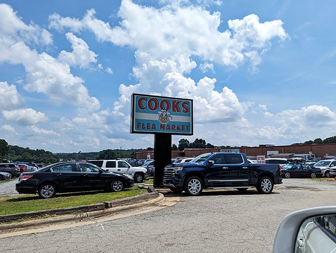 The Cooks Flea Market sign stands tall like a lighthouse guiding treasure hunters to their destination.