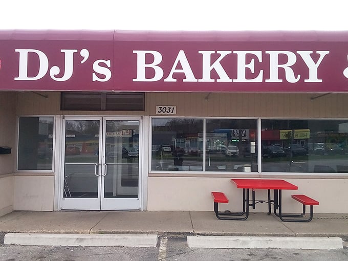 Simple red picnic tables invite you to sit and savor – Ann Arbor's unpretentious donut haven.