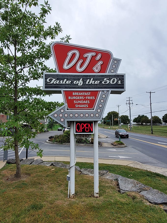 That neon sign glows like a warm invitation, promising a nostalgic "Taste of the 50's" and good old-fashioned grub.