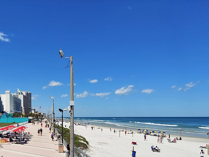 The boardwalk at Daytona Beach brings that classic coastal charm where ice cream cones and sandy toes are the daily uniform.