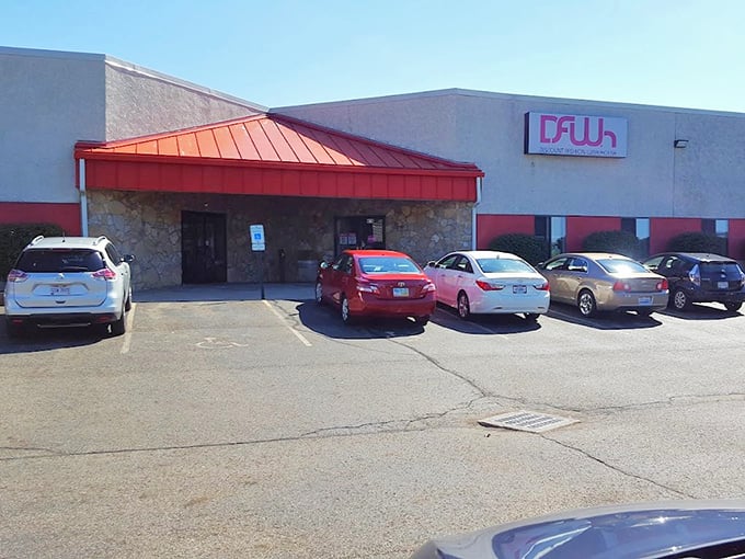 A bold red roof and simple façade mark the spot where bargain hunters discover fashion finds at unbeatable prices.