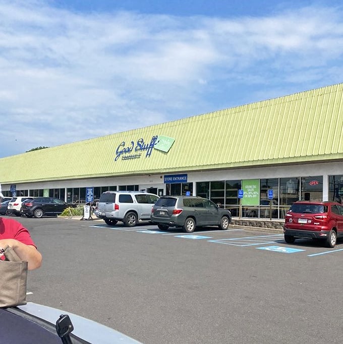 The cheerful yellow-green exterior of Good Stuff Thrift promises sunny bargains inside, rain or shine.