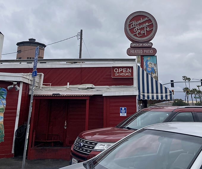 Red, white, and absolutely delicious – this beachside spot serves comfort food with a side of coastal charm.