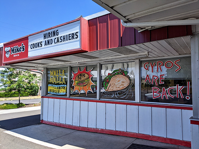 The red and white stripes signal pure nostalgia - like finding a perfectly preserved slice of 1950s dining heaven.