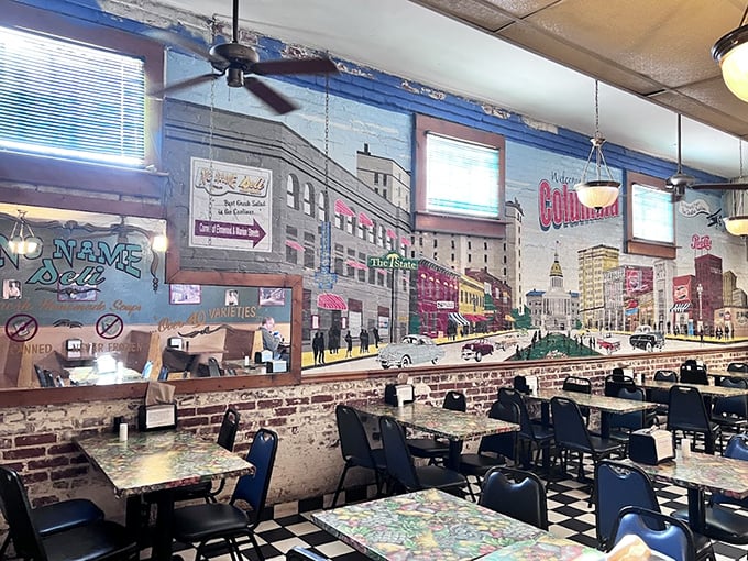 Those murals on the walls tell stories, but the real narrative unfolds between two slices of perfectly prepared bread.
