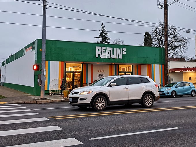 The cheerful green storefront stands out like the perfect vintage dress in a rack of modern fast fashion.