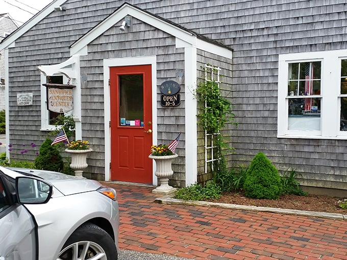 Small but mighty! This charming shingled building with its neat brick walkway promises a curated vintage experience.
