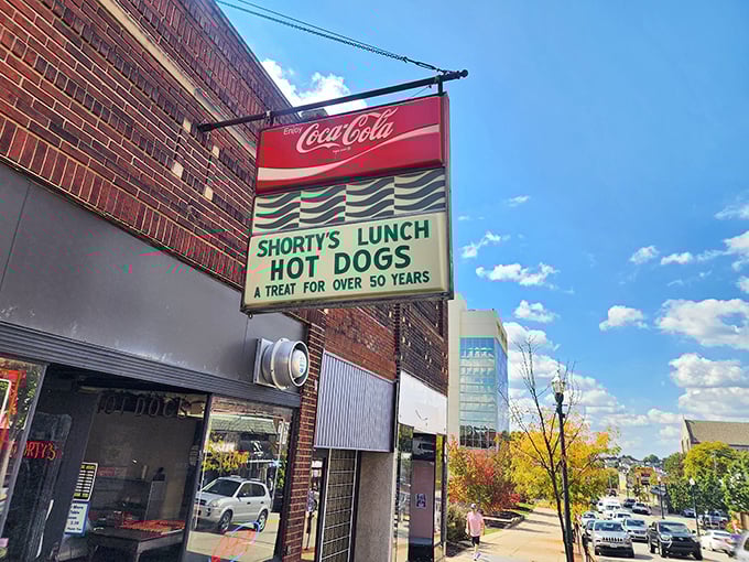 That vintage Coca-Cola sign is like a time machine – transporting taste buds to simpler days.