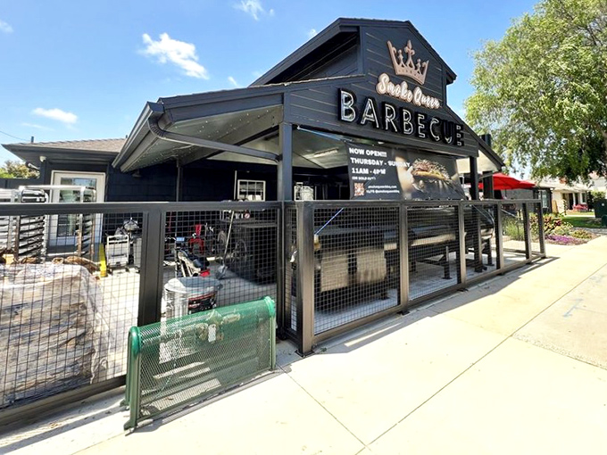 The sleek modern design of Smoke Queen proves great BBQ doesn't always come from weathered shacks—sometimes royalty wears black.
