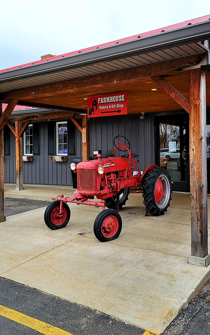 That red Farmall tractor isn't just decoration – it's a promise of authentic rural cooking inside The Farmer's Daughter.