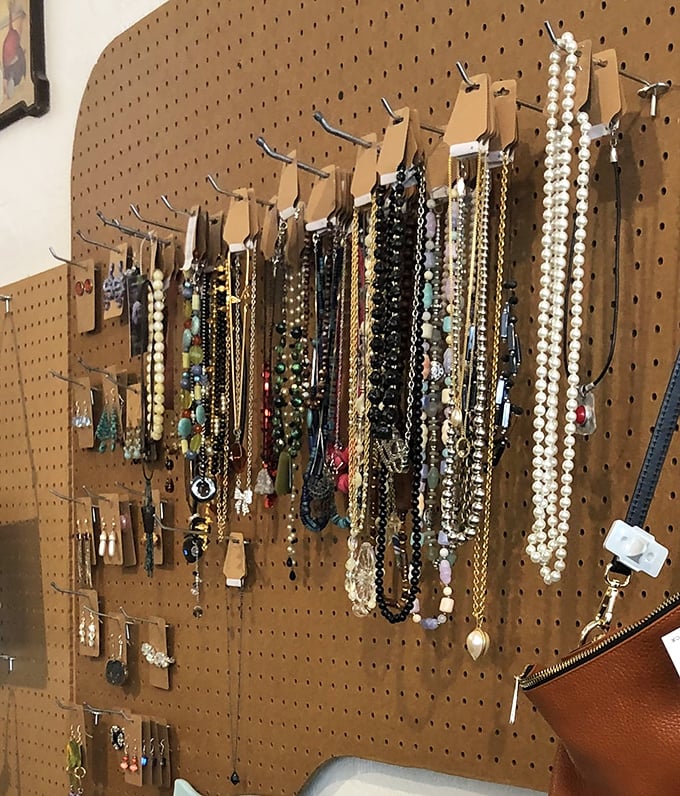 Necklaces dangling like possibilities—from pearls your grandmother would approve of to statement pieces that announce your arrival before you do.