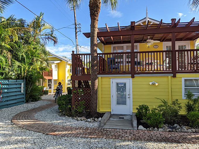 Cheerful yellow cottages with wooden decks capture the essence of island living – where "home" and "vacation" become synonymous.