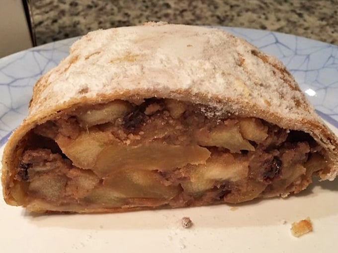 Peek inside this apple strudel and witness the perfect marriage of cinnamon-kissed apples and delicate pastry—a relationship counselor for your taste buds.