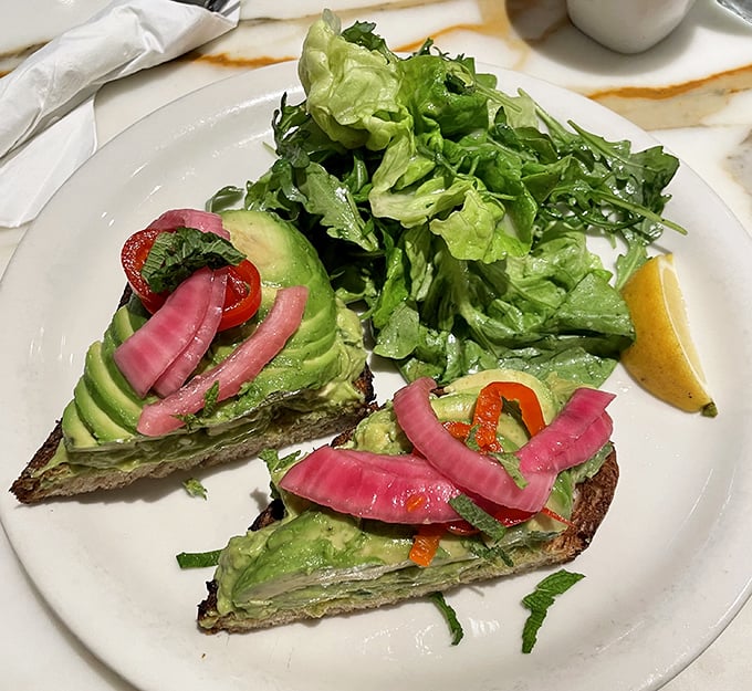 Avocado toast that Instagram dreams are made of—proof that sometimes the simplest combinations create the most spectacular results.