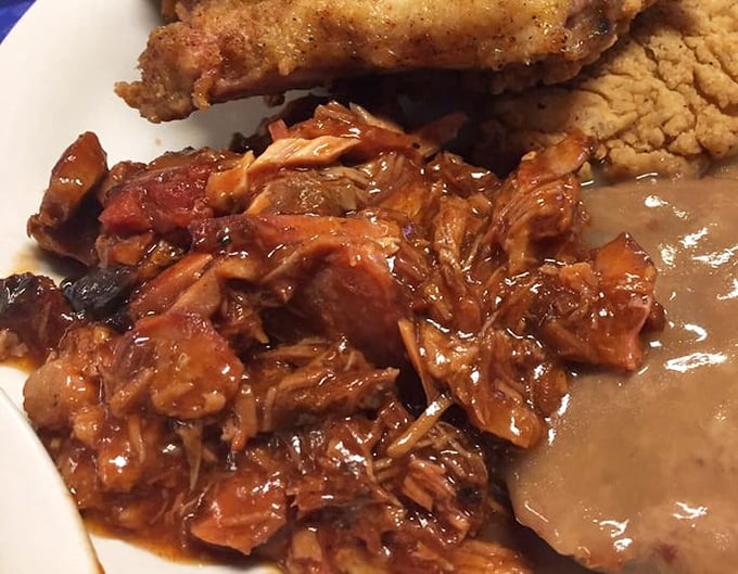 BBQ pulled pork that doesn't need fancy sauce to shine—just slow-cooked perfection that falls apart at the mere suggestion of your fork.