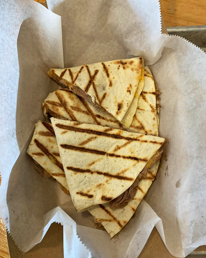 BBQ quesadillas – where Tex meets Mex meets Florida in a grilled tortilla triangle of cross-cultural deliciousness that defies categorization.