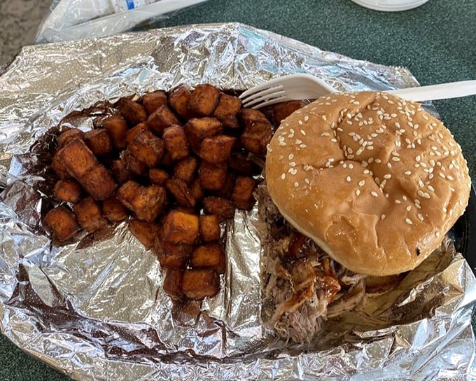 A sandwich that requires both hands and several napkins isn't just lunch—it's an event. Those sweet potato nuggets are calling your name.