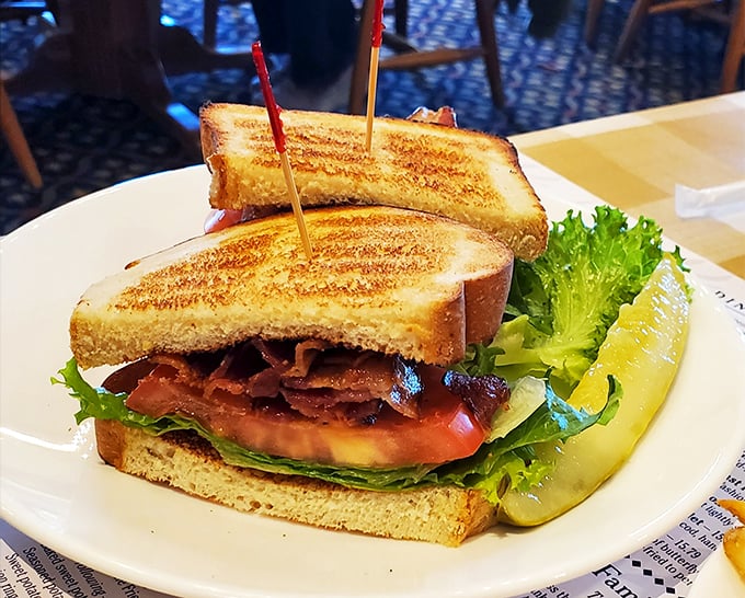 A BLT that takes the classic trio seriously, stacked high with crispy bacon and garden-fresh accompaniments.