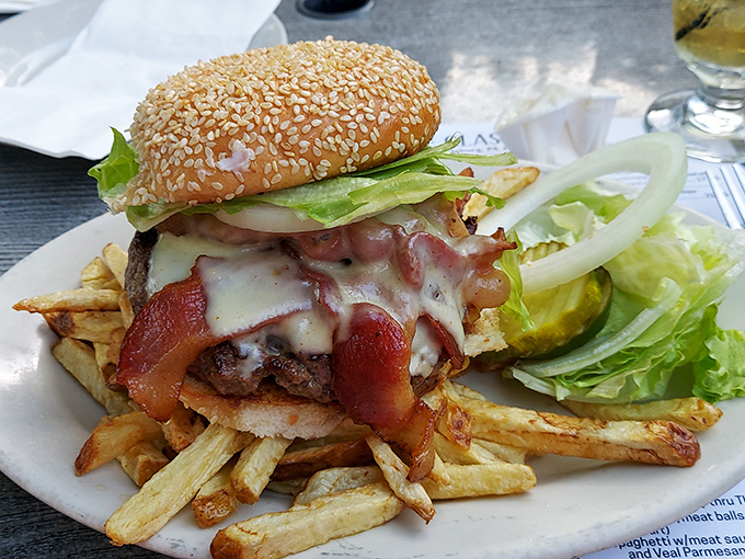 This isn't just a burger—it's architecture, engineering, and pure comfort stacked between a sesame seed bun.