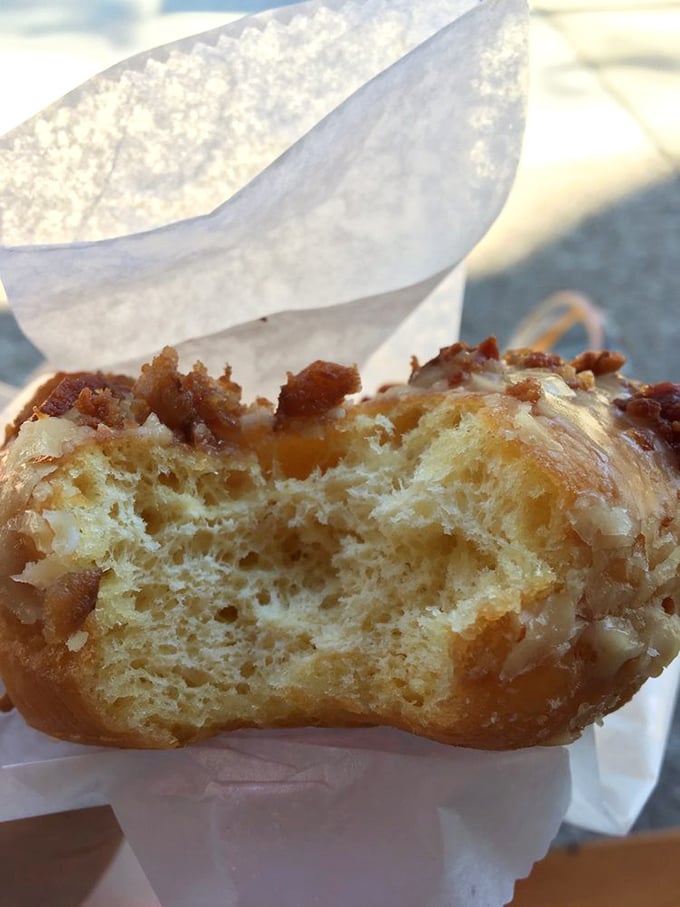 This pastry—golden, flaky, and glistening with sweetness—isn't just eaten, it's experienced, with each bite creating memories that outlast the crumbs.