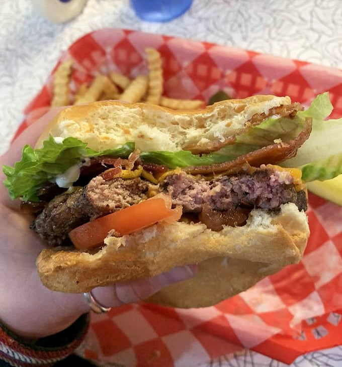 This isn't just a burger—it's a hand-held masterpiece where every ingredient plays its part in the symphony of flavors.
