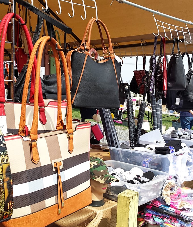 Handbag heaven hanging in the Virginia sunshine. That striped tote is practically screaming "Take me to a farmers market!" while the black leather whispers "job interview."