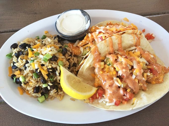 Vacation on a plate: Baja shrimp tacos with a colorful rice sidekick—proof that the best souvenirs from Florida are the flavor memories.