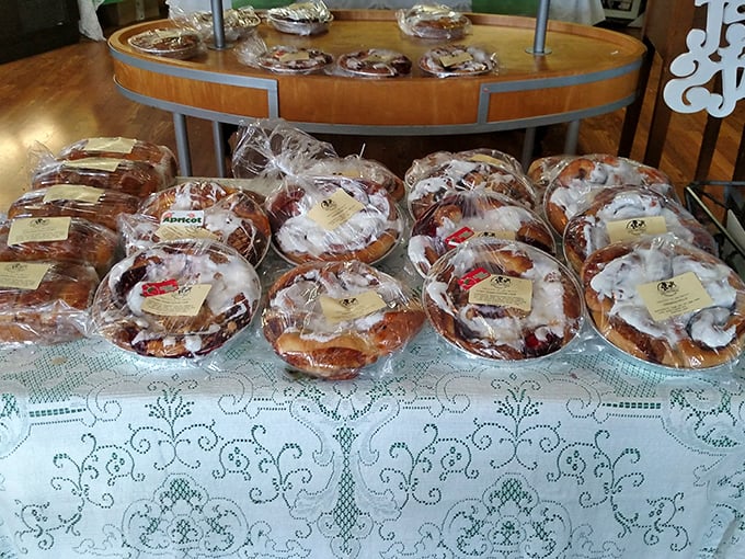 The bakery's display case—where diet plans go to die and "I'll just have one" becomes the day's biggest lie. 