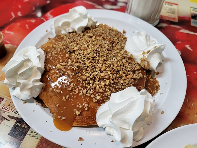 Banana pecan pancakes crowned with whipped cream – because sometimes breakfast deserves to feel like dessert.