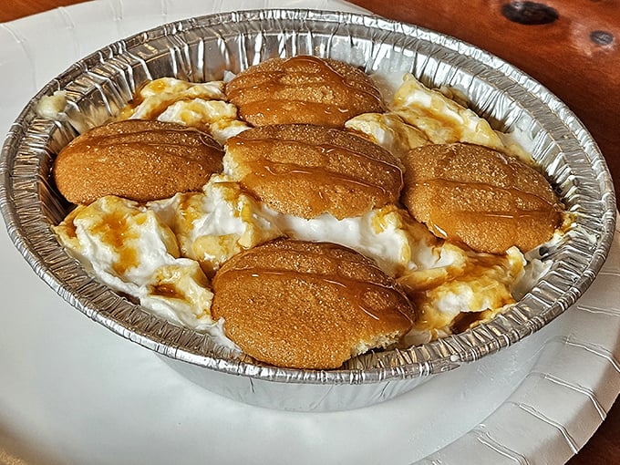 Those golden discs nestled in creamy goodness aren't just banana pudding—they're edible nostalgia that would make your grandmother both proud and jealous.