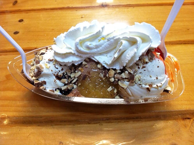 Not your grandmother's banana split (unless she was spectacular). Whipped cream mountains over valleys of custard and caramel—pure bliss.