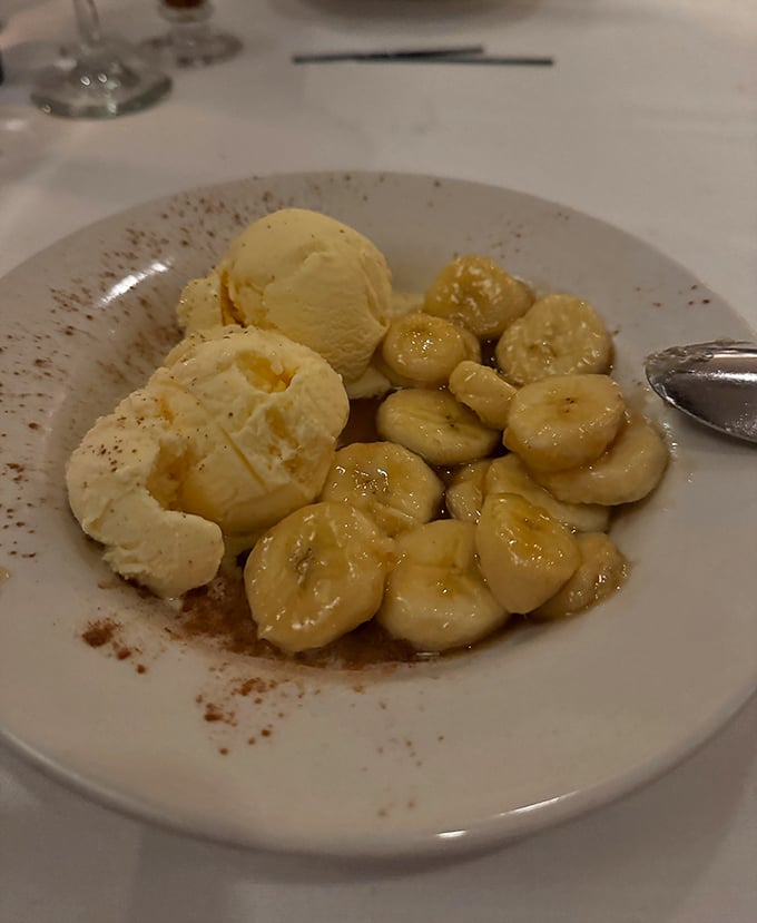 Bananas Foster's sophisticated cousin—caramelized bananas alongside vanilla ice cream. A dessert that makes you want to applaud after the final spoonful.
