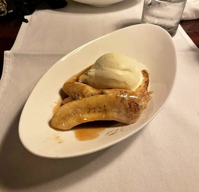 Bananas Foster's simplicity is its genius—caramelized fruit and ice cream creating a hot-cold romance that never goes out of style.