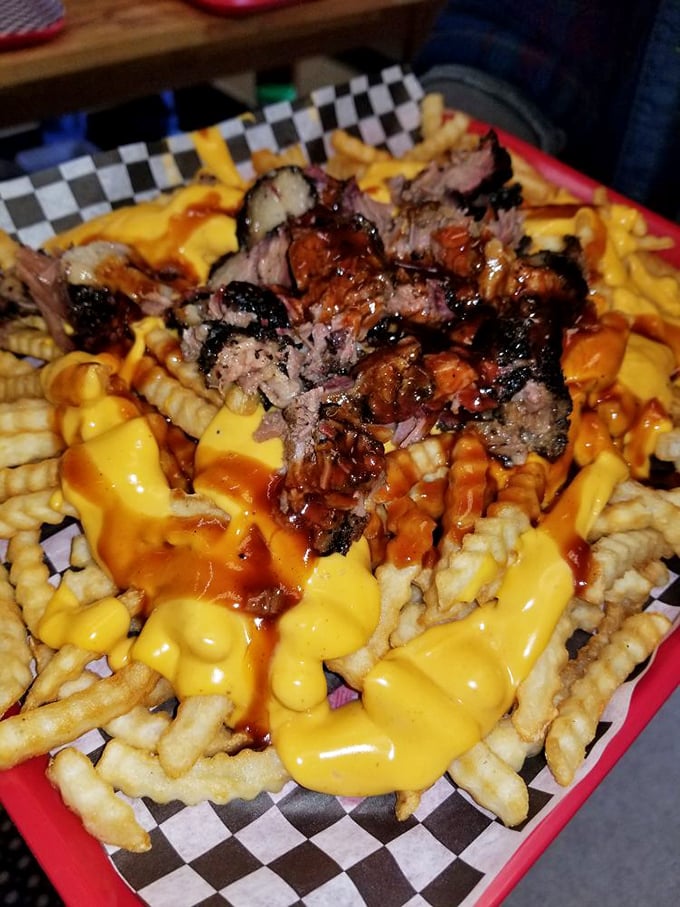 BBQ cheesy fries that blur the line between side dish and main event. The brisket on top isn't garnish—it's the crown jewel of this comfort food kingdom.
