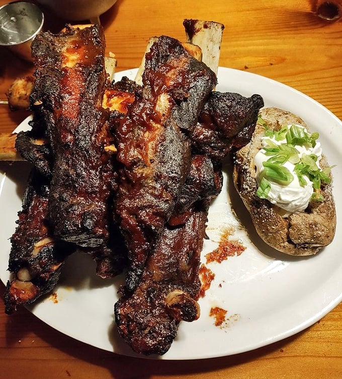 These beef ribs aren't just falling off the bone—they're practically filing for independence. Smoky, sticky, and substantial enough to make Fred Flintstone jealous.