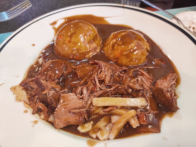 Beef and noodles swimming in rich gravy with homemade dumplings—the kind of dish grandmothers fight over at family reunions.